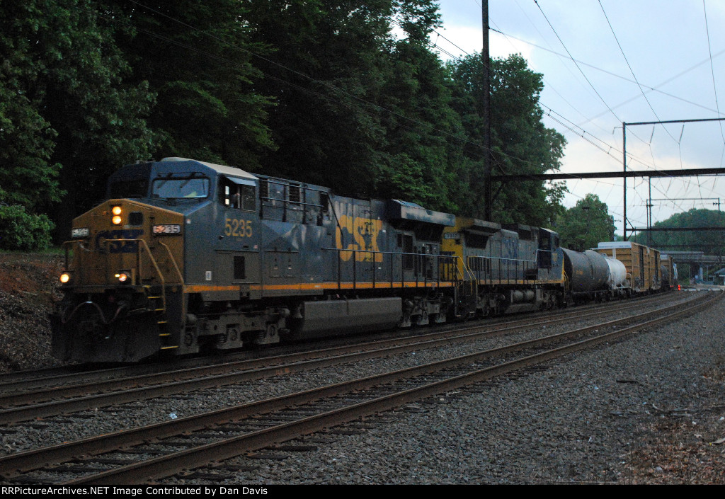Q438-14 with CSX ES40DC 5235 leading the way